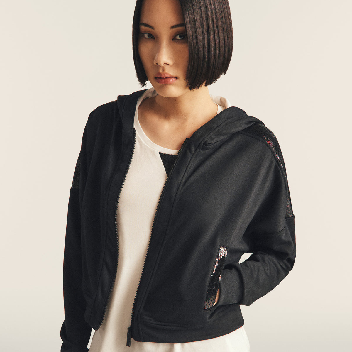 Short zip hoodie with sequins details